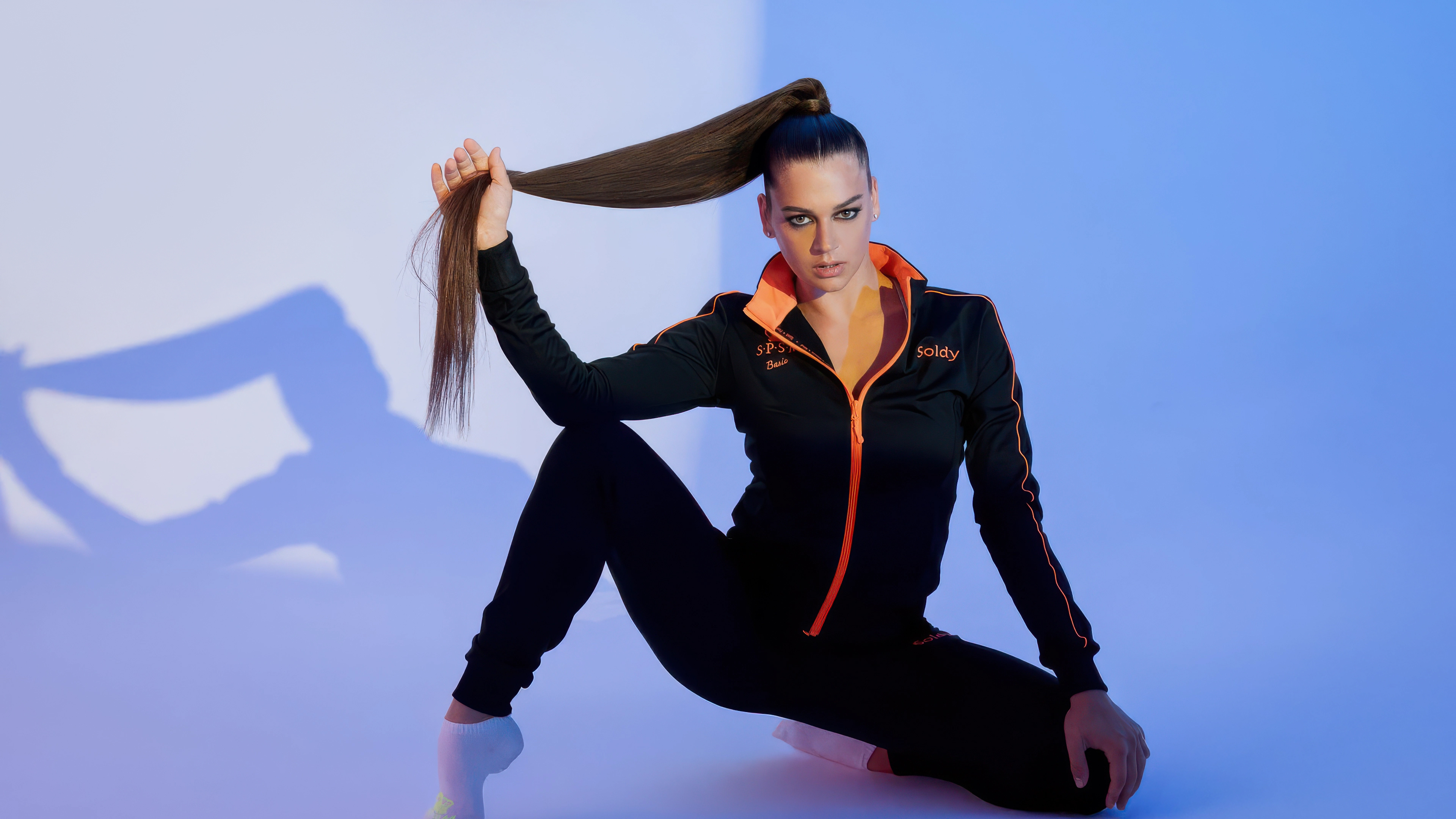 3840x2160 Black And Orange Tracksuit Model Posing 4K ,HD 4k Wallpapers ...