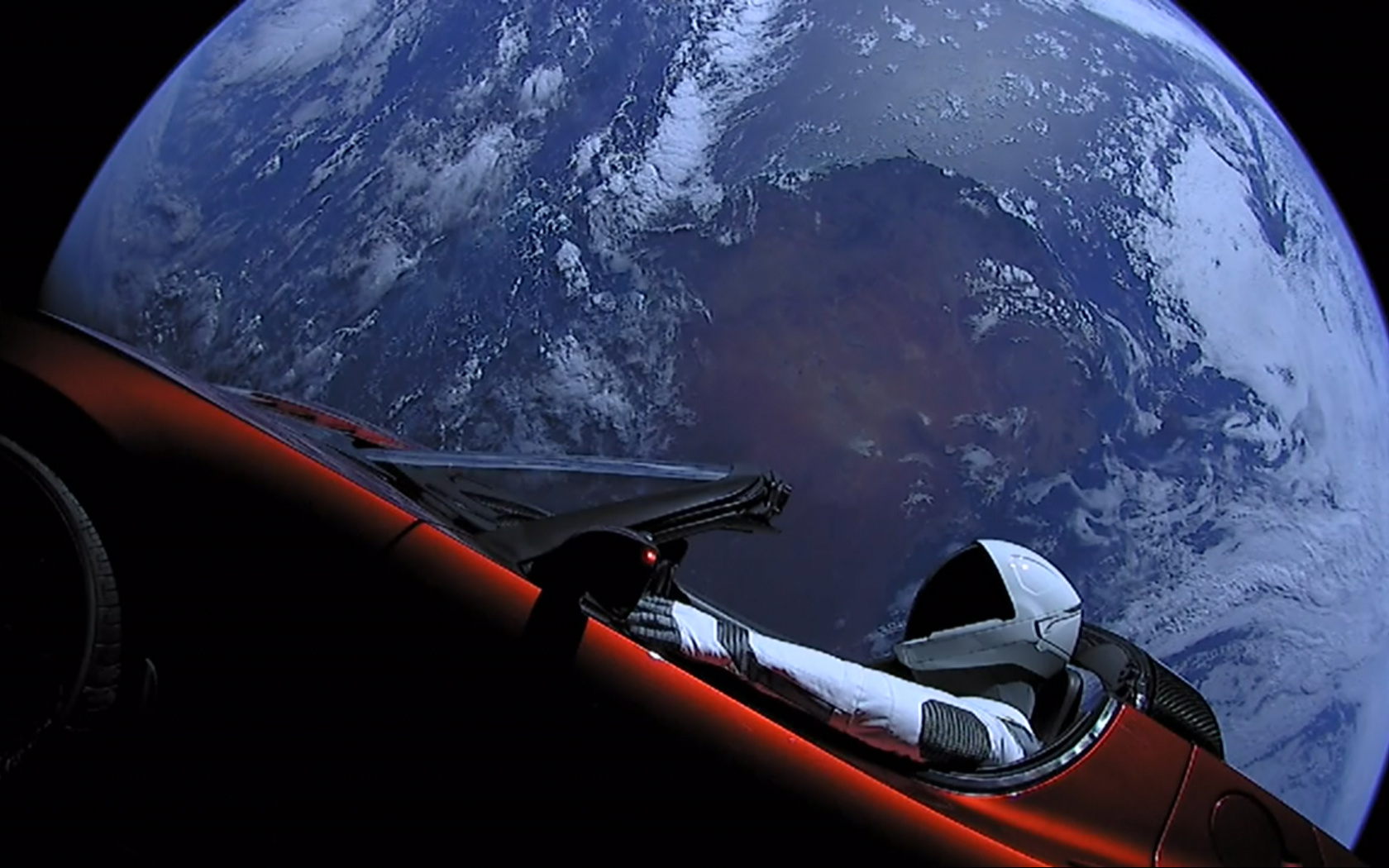 1680x1050 Tesla Roadster In Space With Space Suit Man Wallpaper ...